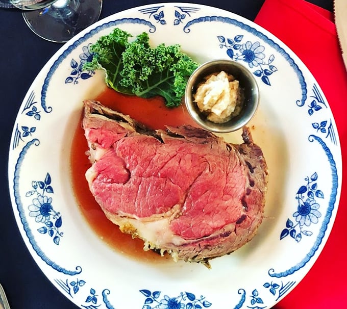 Prime rib so perfectly pink it should be framed in an art gallery. That little cup of horseradish is standing by, ready to clear your sinuses.