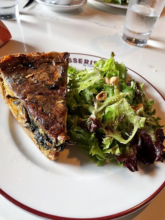 This quiche isn't just breakfast—it's architecture. A perfectly flaky crust cradles a savory filling that makes ordinary eggs question their life choices.
