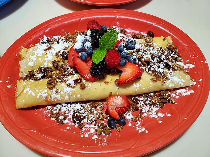 These berry-topped crepes are what breakfast fantasies are made of. Powdered sugar snowfall included at no extra charge.