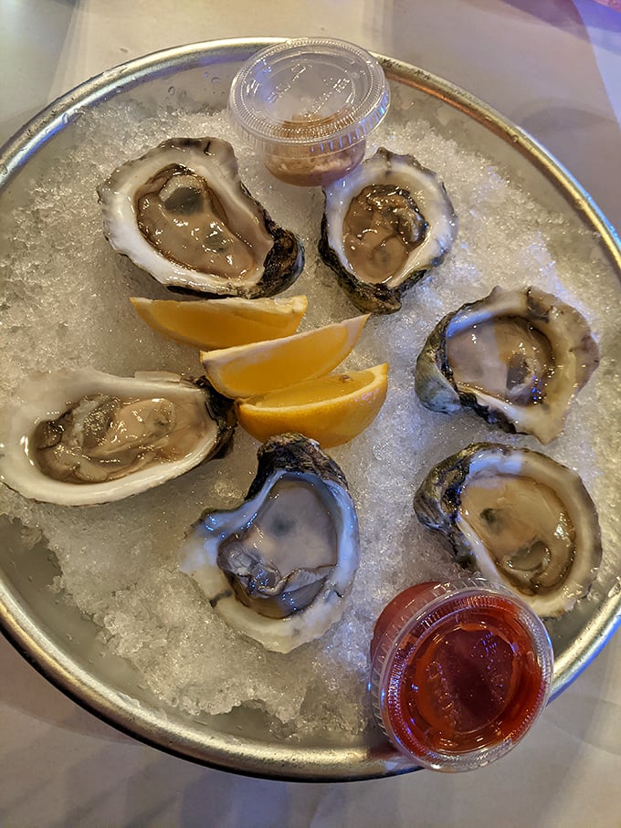 Fresh oysters on ice with lemon wedges standing by—briny jewels that somehow found their way to the Midwest without losing their ocean magic.