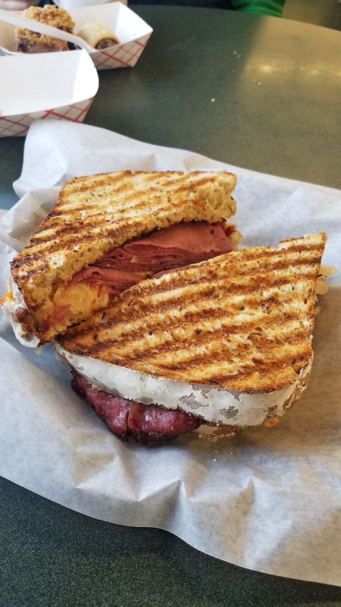 The Reuben at Barry's: where pastrami, melted cheese, and grilled bread perform a symphony that would make Beethoven weep.
