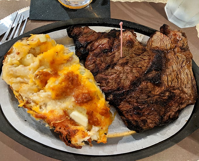 The T-bone and cheesy potato casserole—a plate that says "You won't need dinner tomorrow" in the most delicious way possible.