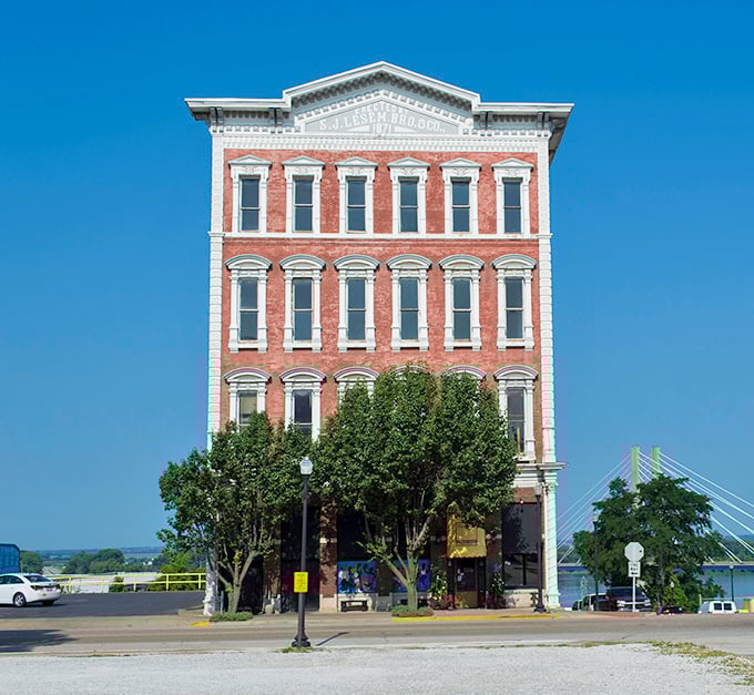 St. Francis Solanus Church reaches skyward with red-brick determination, a spiritual landmark that's been photobombing family portraits for generations.