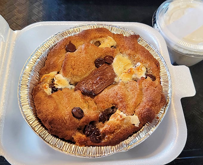 S'mores pie brings childhood campfire memories indoors – minus the mosquitoes, plus exponentially more chocolate and graham cracker goodness.