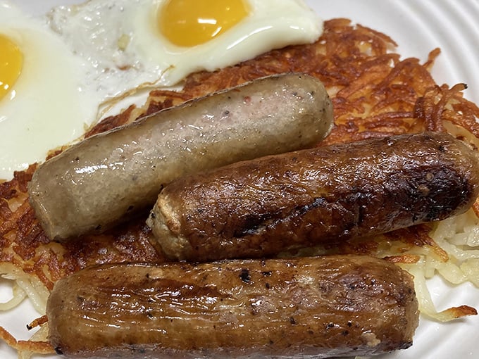 These sausages aren't just breakfast meat—they're morning ambassadors of flavor, nestled beside eggs and hashbrowns like old friends.