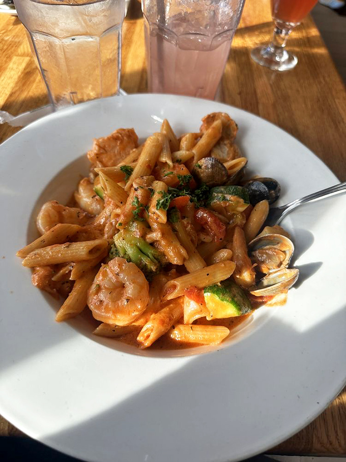 Pasta playing host to an underwater reunion of shrimp, clams, and other oceanic VIPs. A fork-twirling celebration that tastes like coastal Italy.