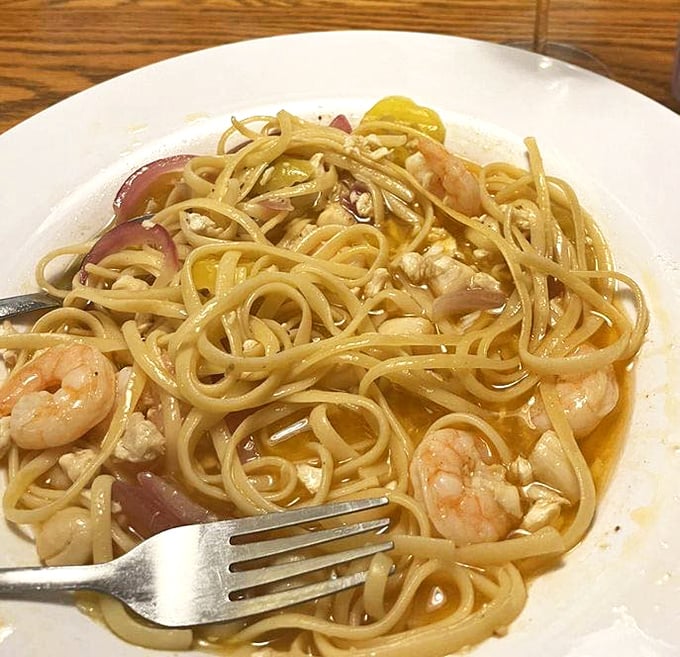 Seafood pasta that doesn't need to shout about its freshness—the plump shrimp and delicate sauce speak volumes.