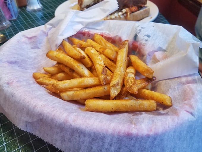 These aren't just fries—they're golden vehicles purposefully designed for transporting any remaining sauce from plate to mouth.