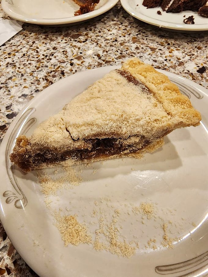 Shoofly pie—the dessert that launched a thousand diets tomorrow. Molasses-rich and topped with crumbs, it's Pennsylvania's sweet contribution to American cuisine.