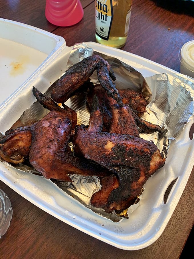 These wings aren't just smoked, they're transformed – their burnished exterior hiding juicy meat that's absorbed hours of smoky wisdom.