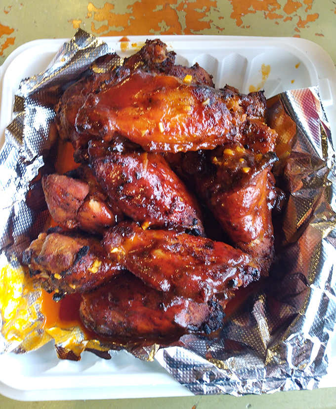 These wings aren't just smoked—they're transformed. The kind of sticky, glistening perfection that makes you forget about your dry cleaning bill.
