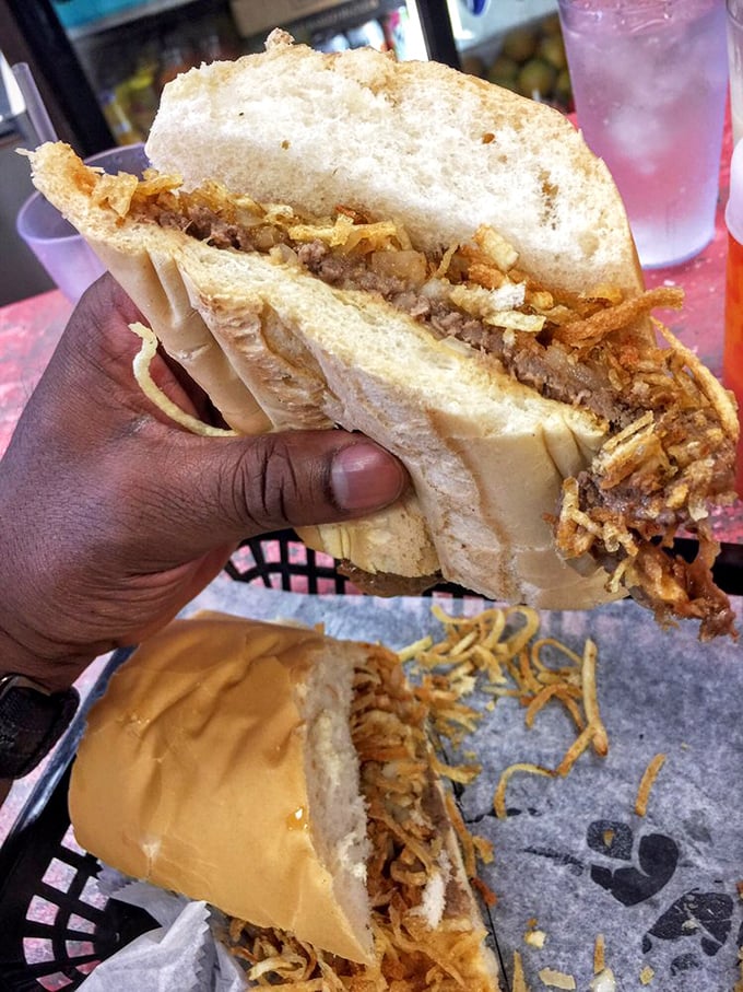 This steak sandwich isn't just lunch—it's an engineering marvel of bread, meat, and those signature crispy potatoes that define Miami's soul.
