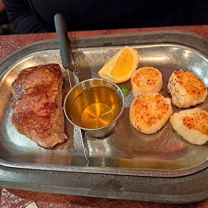 Surf meets turf in perfect harmony – a steak cooked exactly as promised alongside scallops with that coveted caramelized crust. Ocean and pasture, united at last.