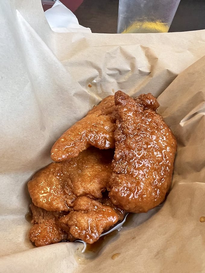 These sticky fingers aren't just food—they're edible evidence that sometimes the messiest meals create the cleanest memories.
