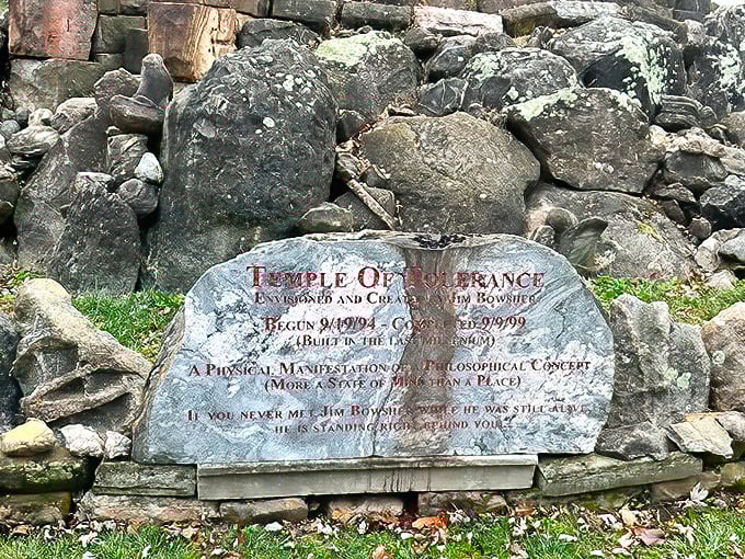 The garden's origin story etched in stone – a physical manifestation of philosophical concepts that began in 1994 and continues evolving today.