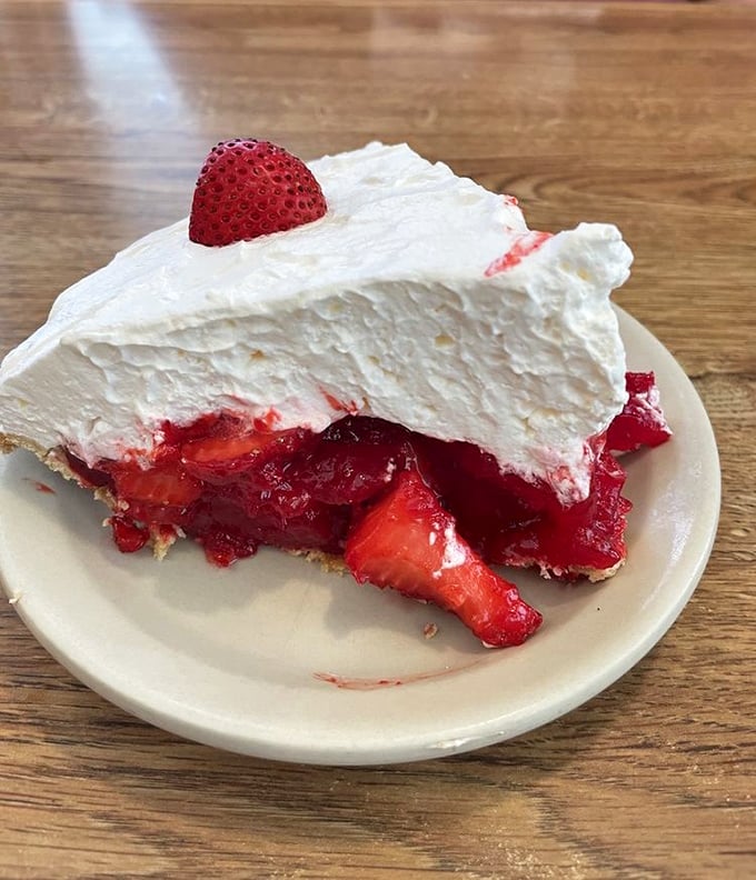 This strawberry cream pie doesn't just whisper "dessert" – it belts out a Broadway-worthy finale to your meal that demands a standing ovation.