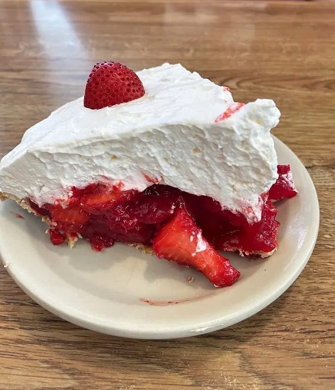 This strawberry cream pie doesn't just whisper "dessert" – it belts out a Broadway-worthy finale to your meal that demands a standing ovation.