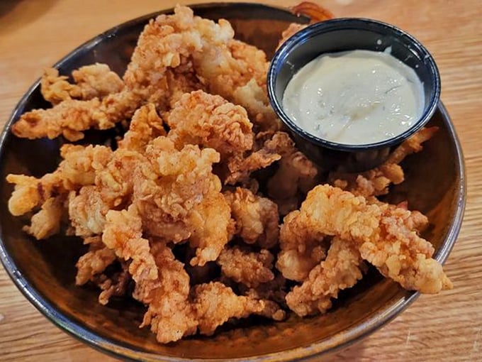 These crispy fried strips aren't just appetizers—they're edible proof that sometimes the simplest preparations yield the most satisfying results.