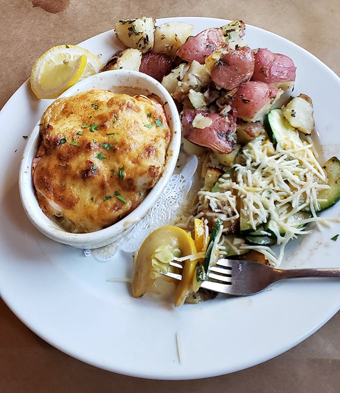 This isn't just dinner—it's a seafood treasure chest featuring what might be the Eastern Shore's most perfect crab cake.
