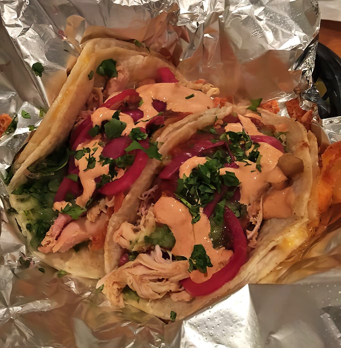 Tacos that refuse to be pigeonholed into any single barbecue tradition. That pink sauce isn't just pretty—it's a flavor revelation waiting to happen.