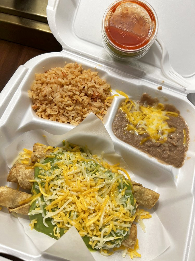 The combination plate—where rice, beans, and enchiladas gather for a flavor summit that always ends in unanimous satisfaction.