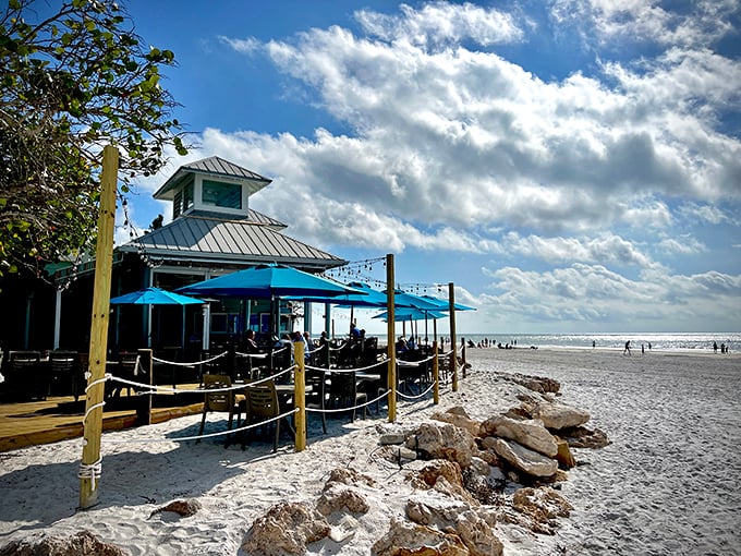 The Sandbar Restaurant takes "beachfront dining" literally. When your feet are in the sand and your fork's in fresh grouper, life hits different.