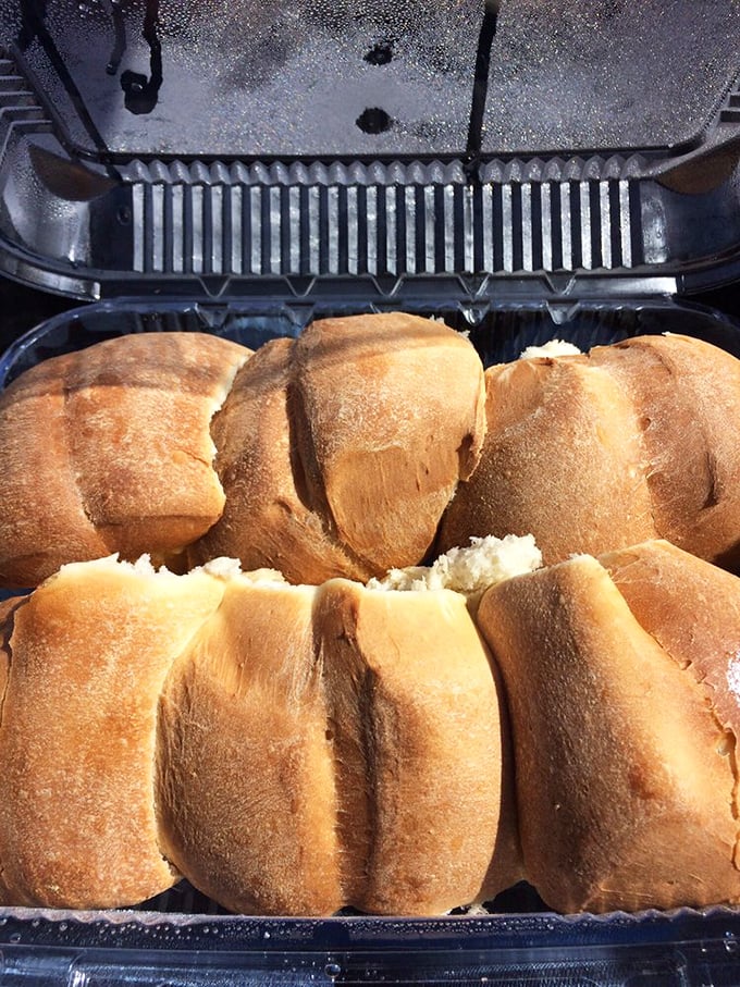 Fresh from the oven, these pillowy rolls aren't just bread—they're projectiles of joy waiting for their moment of airborne glory.