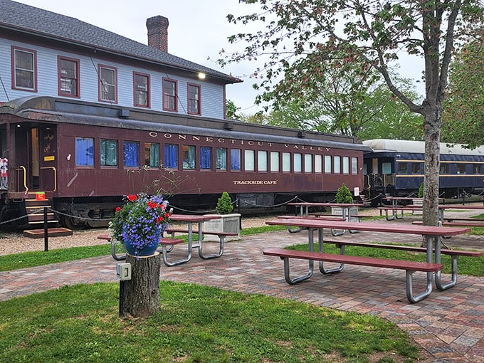 The Trackside Cafe offers more than just meals—it serves up nostalgia with a side of Connecticut Valley views. Those picnic tables have heard some stories.