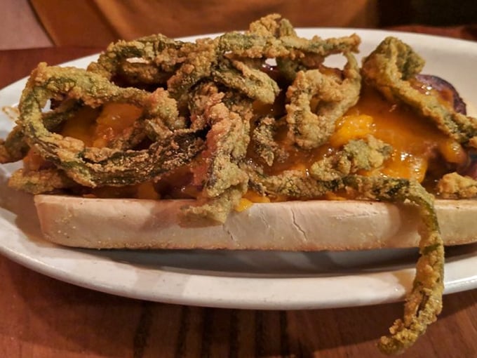 The Triple Dog Dare Ya isn't just a sandwich—it's an engineering marvel of fried goodness that makes you wonder if calories consumed while smiling don't count.