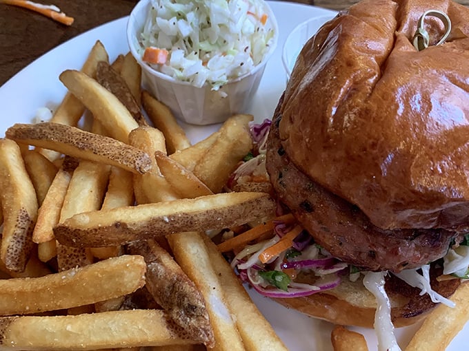 Golden fries and a burger that proves even landlubbers can find happiness at a serious seafood establishment like this.