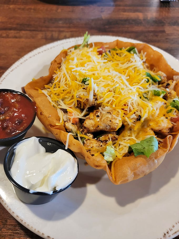 Taco Tuesday meets the ocean in this edible tortilla bowl. Cheese, seasoned protein, and two perfect dipping sauces—it's a fiesta for your mouth.