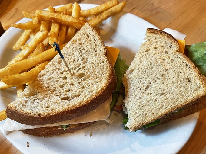 Even lunch gets the royal treatment here—this sandwich and fries combo proves The Breakfast Club isn't just a one-meal wonder.
