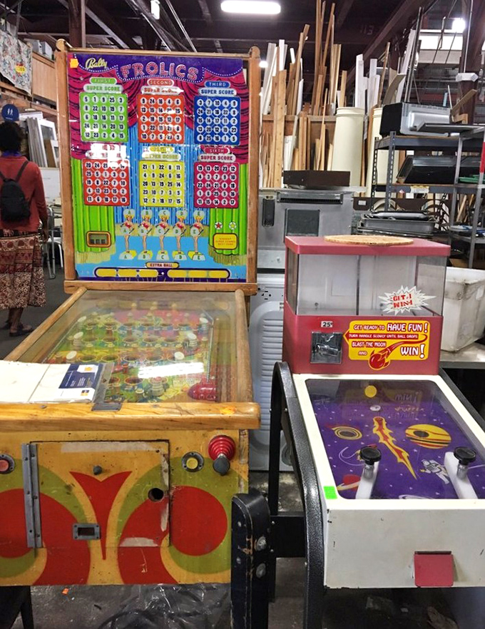 Vintage arcade games stand ready for their second act. That pinball machine probably ate many quarters during the Carter administration.