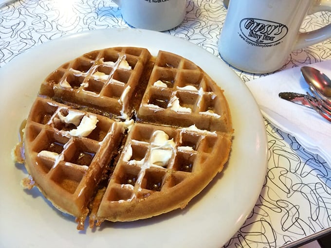 A waffle that's achieved the golden-brown perfection we all aspire to, with butter melting into every perfect square.