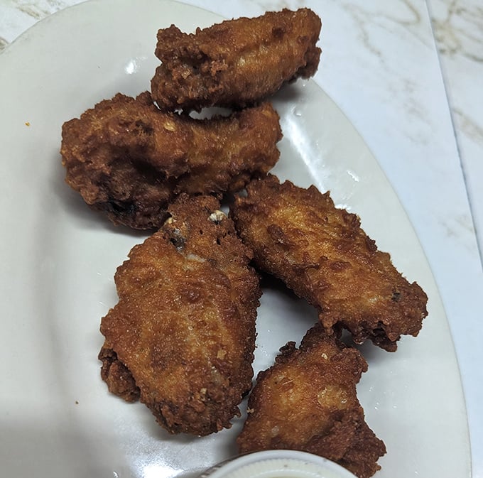 These wings aren't trying to reinvent poultry—they're just doing what great diner food does: delivering crispy, juicy satisfaction without pretension or gimmicks.