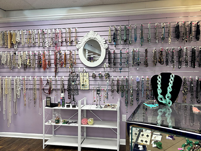 The jewelry wall transforms costume accessories into treasure—proving that with the right display, even plastic can look positively regal.