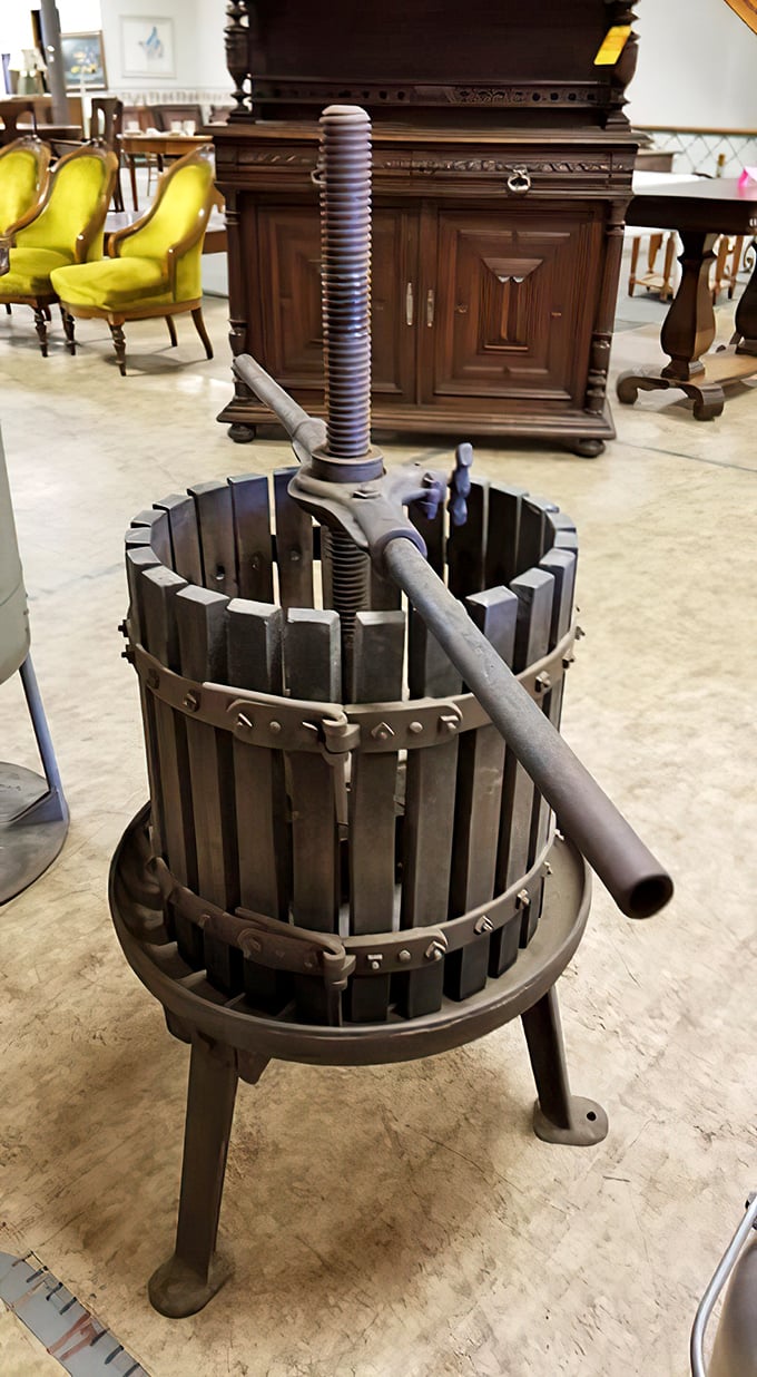 This antique wine press isn't just functional history—it's the ultimate conversation piece for your rustic dining room.