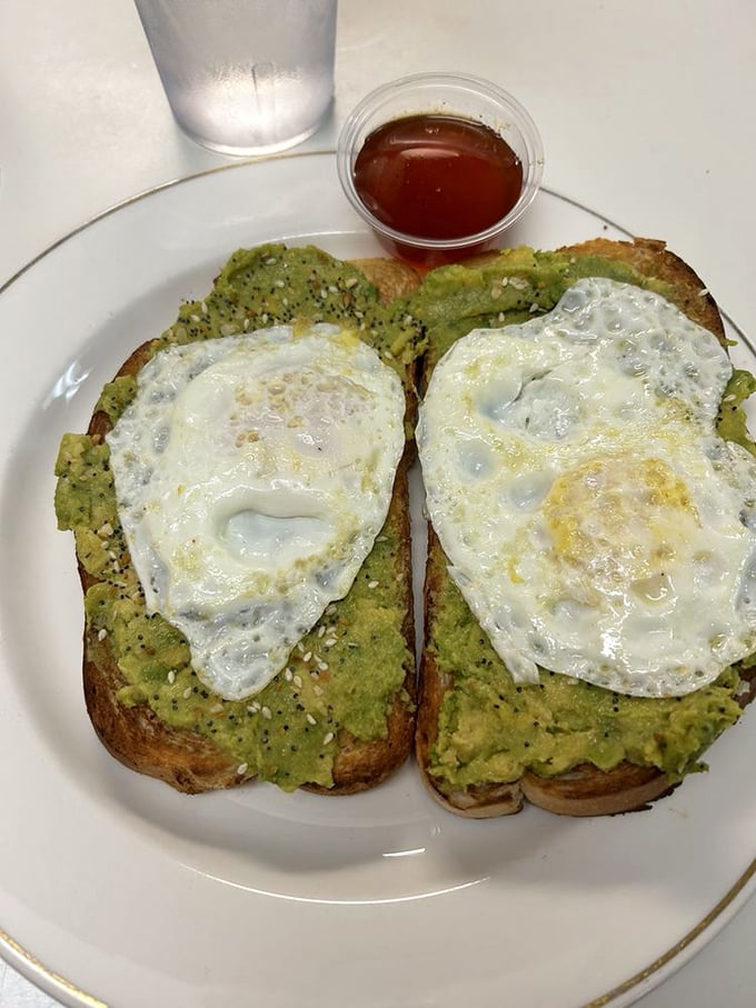 Avocado toast that bridges the generation gap – Boomers and Millennials finally finding common ground on perfectly toasted bread with sunny-side eggs.