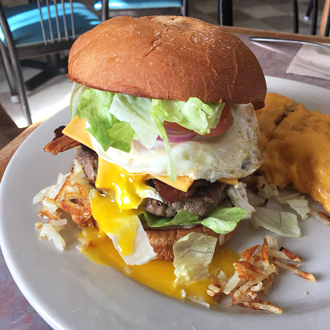 The burger that doesn't understand the concept of "too much." Beef, bacon, cheese, egg, and veggies stacked so high you'll need to unhinge your jaw.