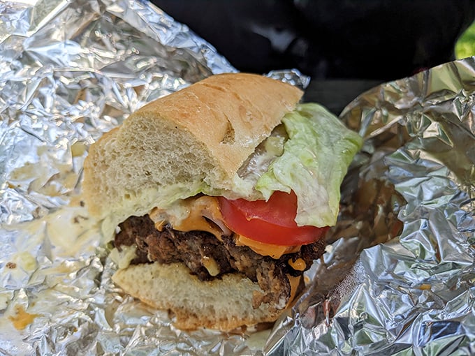 When a burger comes dressed with fresh lettuce, tomato, and melted cheese, you know you're not at some fast-food assembly line—you're somewhere special.