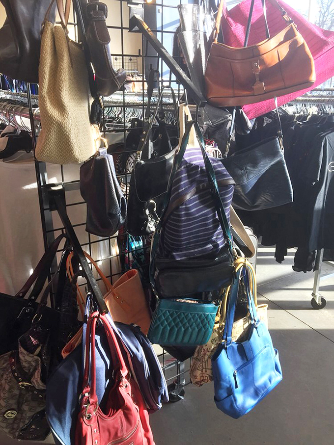 The handbag corner—where designer dreams meet bargain reality. That blue tote might have once carried someone's screenplay or just their lunch.