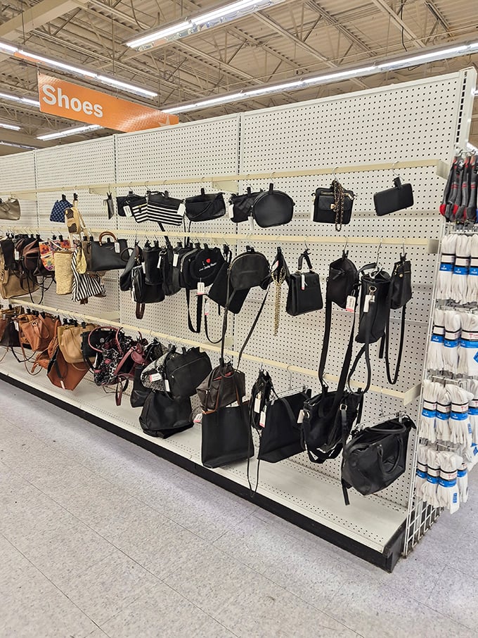 Handbag heaven! Where yesterday's must-have purses hang in patient rows, waiting for their second act in someone else's wardrobe rotation.