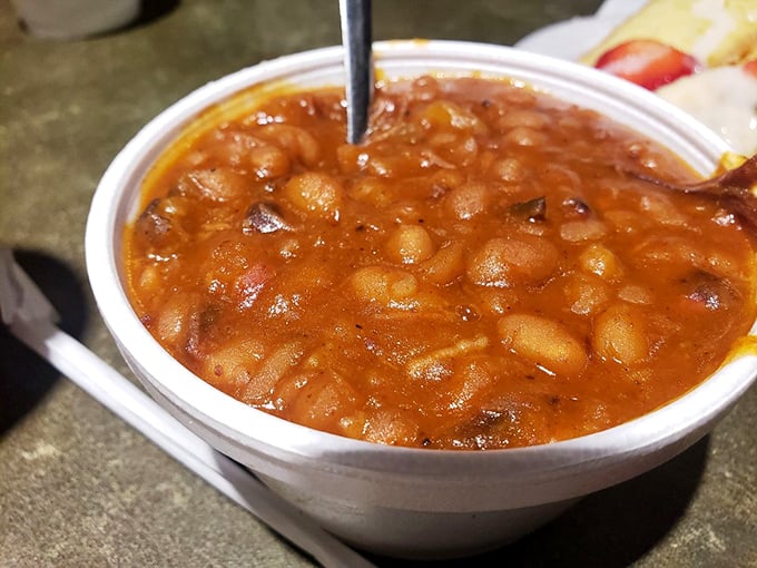 These baked beans aren't just a side—they're a supporting actor so good they occasionally steal the show from the meaty stars.