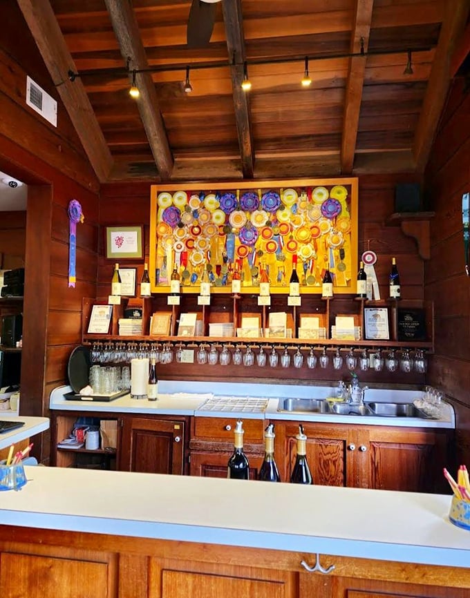 Inside the tasting room, award ribbons create a colorful backdrop – like Olympic medals for grapes that reached their highest potential.