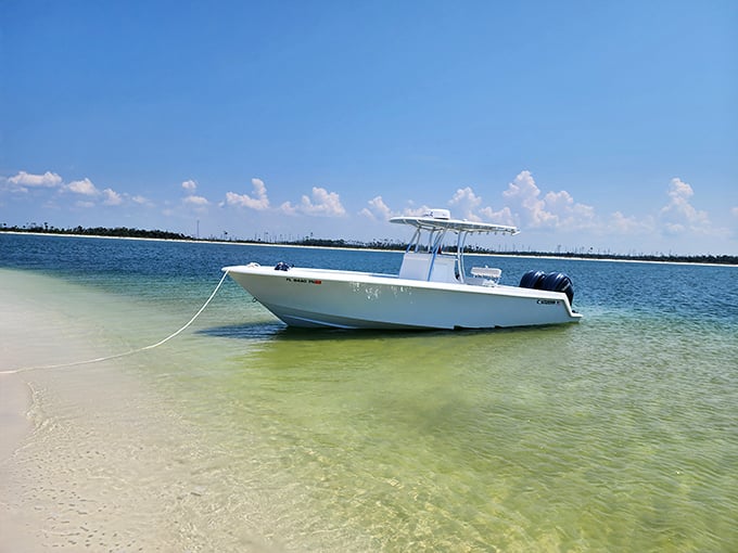 Crystal waters so clear you can count the grains of sand beneath. This shallow bay offers boating paradise for those seeking aquatic escape.
