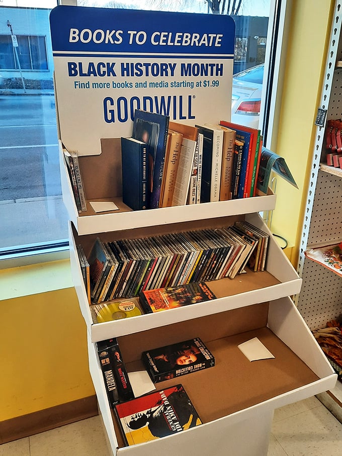The Black History Month book display showcases the thoughtful curation that elevates this Goodwill beyond mere secondhand store to community resource.
