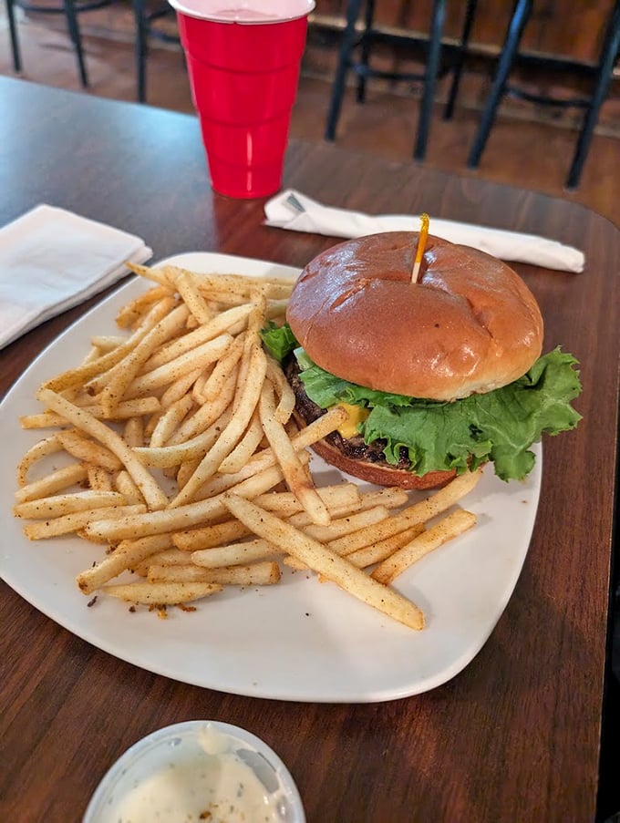 A burger that doesn't need a paragraph of adjectives or a culinary degree to enjoy—just honest beef, fresh toppings, and a bun that knows its role.