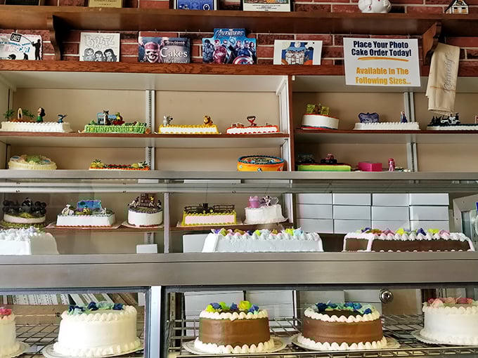 That cake display showcases everything from superhero themes to elegant classics – because every celebration deserves something spectacular and homemade.