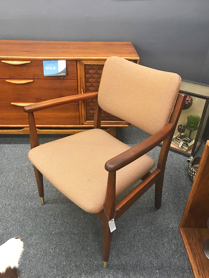 This mid-century chair isn't just furniture—it's time travel. Sit here and you can practically hear The Beatles on the hi-fi and ice clinking in martini glasses.