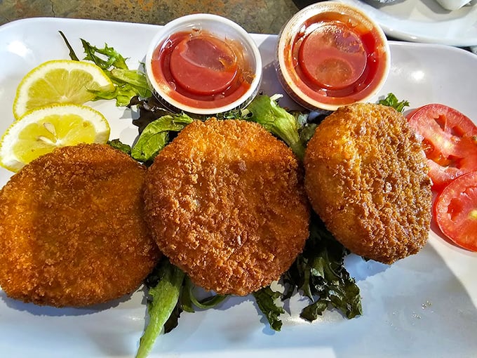 Crab cakes so golden and crispy they deserve their own trophy. Served with enough sauce for proper dunking – as all good crab cakes should be.